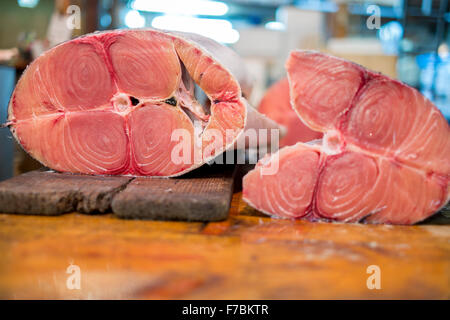 Fresh swordfish cut and on display in the Tsukiji fish market in Tokyo ...