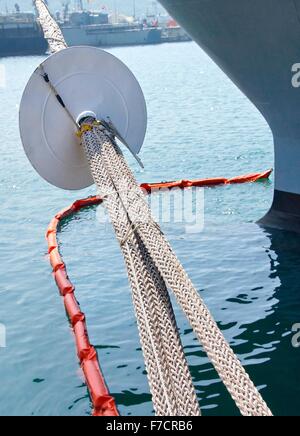 Rat Guard on mooring line of container ship Stock Photo - Alamy