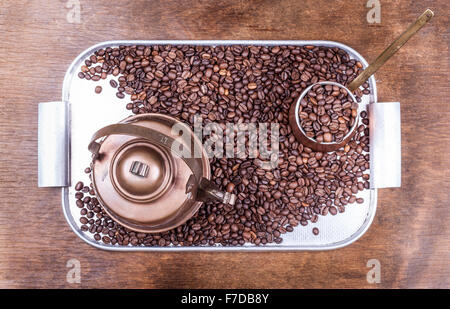 cezve or ibrik and vintage kettle top view background Stock Photo - Alamy