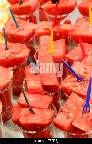 Cut fresh juicy watermelon on dark grey table Stock Photo - Alamy