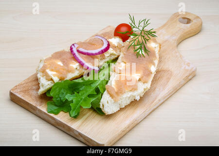 Sandwich with cod roe, salad, onion and dill Stock Photo - Alamy
