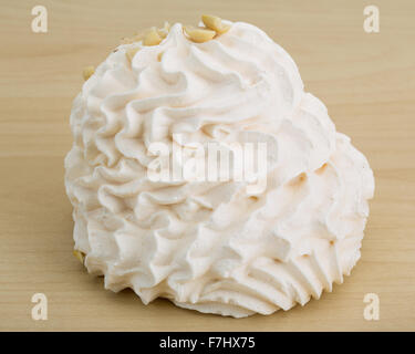 White meringue with nut on the wood background Stock Photo - Alamy