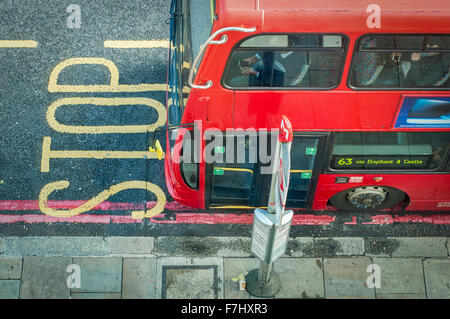 London bus at a bus stop from above Stock Photo - Alamy