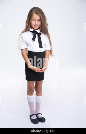 Pretty elementary school girl posing at camera Stock Photo - Alamy
