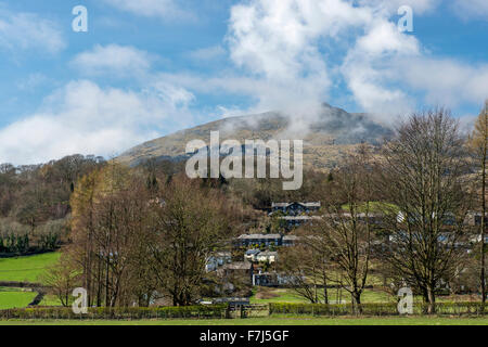 Village of Coniston in the Lake District on a winters day with Crown ...