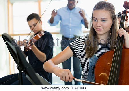 Girl playing cello Stock Photo - Alamy