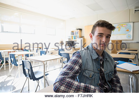 Portrait of a sitting teenage boy in summer Stock Photo - Alamy