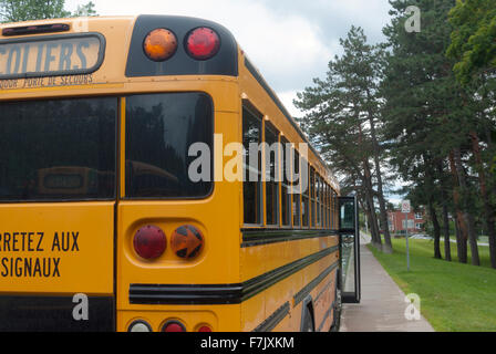 Emergency Exit sign on a school bus Stock Photo - Alamy