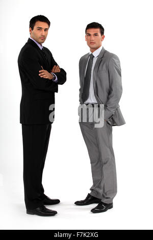 Two businessmen stood together Stock Photo - Alamy