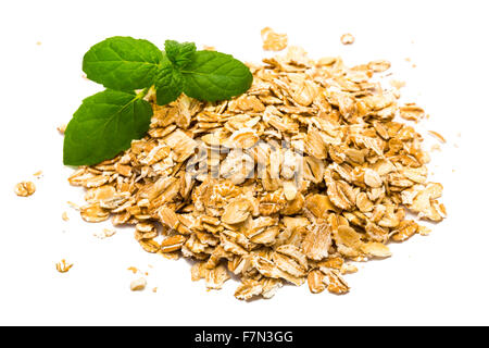 Oats pile with mint branch Stock Photo - Alamy
