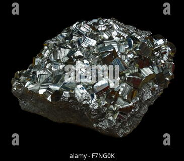 Pyrite. The mineral's metallic luster and pale brass-yellow hue give it ...