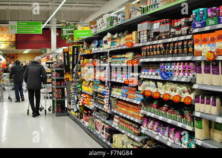 People shopping in Asda supermarket aisle, Asda, Bury St Edmunds ...