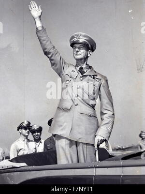 General Jonathan Wainwright, waving to crowd during ticker tape parade ...