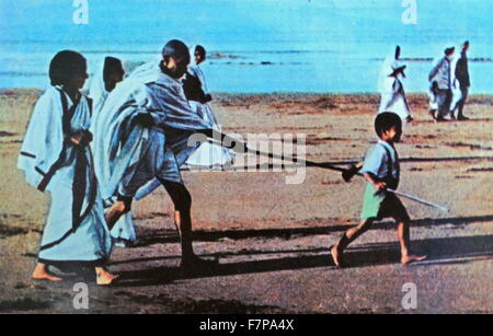 Mohandas Gandhi on the Salt March in 1930. He walked from 240 miles to ...