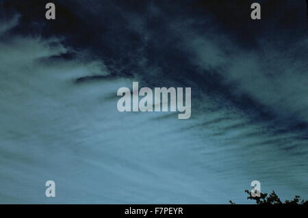 Photograph of Altocumulus cloud, a middle-altitude cloud genus that ...