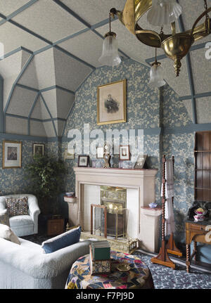 Fireplace in Cragside Northumberland UK lounge art artwork stone pillar ...