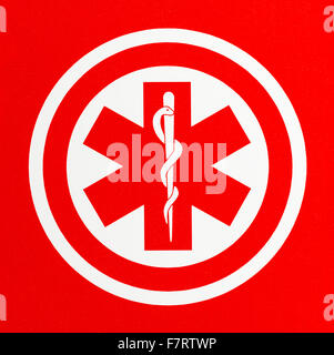 Red Medical Caduceus Symbol in Cross on a white background. 3d ...