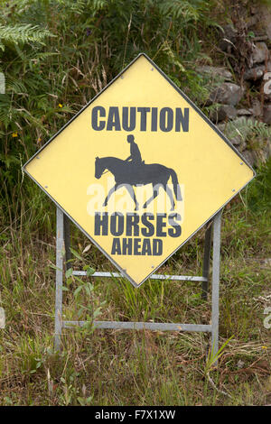 Yellow Horse Riding Warning Sign Stock Photo - Alamy