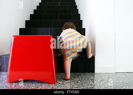 baby crawling up stairs Stock Photo - Alamy
