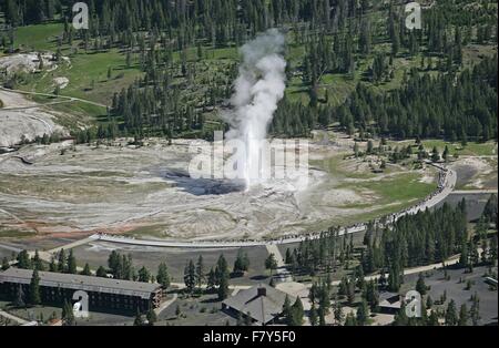 Aerial view of the Old Faithful geyser hot water eruptions at Wyoming ...