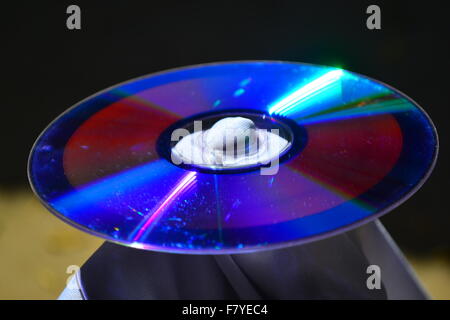 Surface of a DVD CD reflecting lights of different wavelengths Stock ...