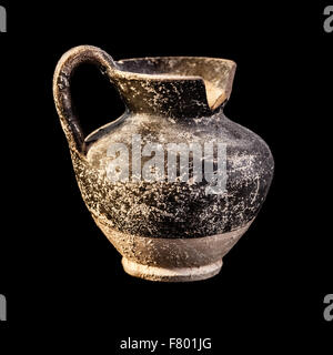 Apulian black pottery ancient Canosan skiphos vase isolated over a ...