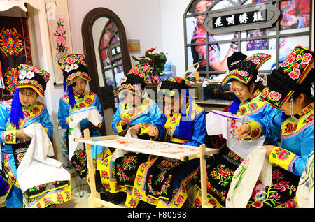 Hanzhong, China's Shaanxi Province. 3rd Dec, 2015. Craftswomen make ...