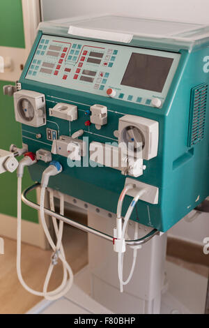 Screen monitor of a kidney dialysis (haemodialysis) machine showing the ...