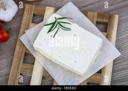 Traditional Caucasian homemade Cheese Brinza with rosemary on wood ...