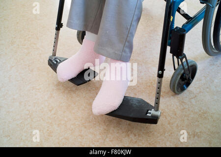 Disabled woman in wheel chair visiting man doctor Stock Photo - Alamy