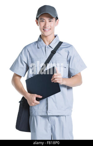 Shot of a Asian IT Engineer Using Laptop in a Data Center Server Room ...