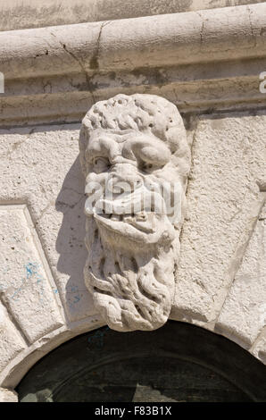 Venice, Veneto, Italy. Grotesque face on the baroque façade of the ...