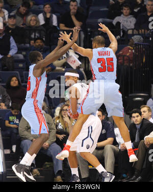 Delaware State guard Todd Hughes (35) goes to the basket as Utah ...