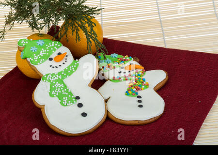 Christmas gingerbread with snow shugar on the nippet Stock Photo - Alamy