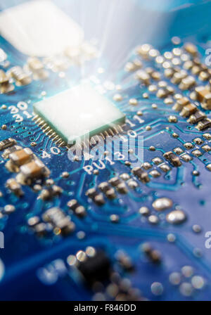 Blue computer electronic chip with blue glow, multiple filter effect ...