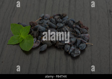 Dry blue berberis with mint Stock Photo - Alamy