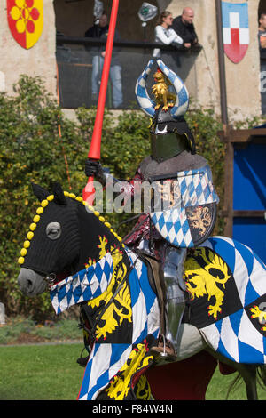 Heavy medieval cavalry knight with lance on military horse. Taken in ...