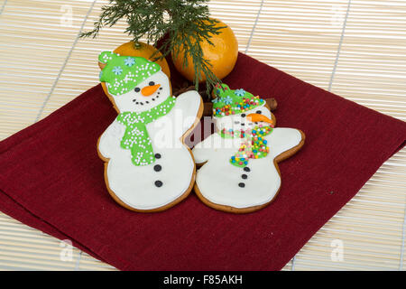 Christmas gingerbread with snow shugar on the nippet Stock Photo - Alamy
