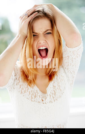 Close up of a teenage girl shouting Stock Photo - Alamy