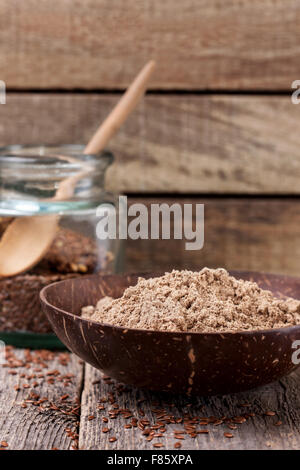 flax seeds in a wooden bowl on a wooden background, top view Stock ...