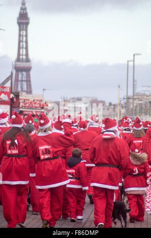 Blackpool, UK. 6th December 2015. Santa's dash event takes place along ...