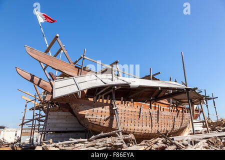 Traditional dhow in the dockyard of Manama, Kingdom of Bahrain Stock ...
