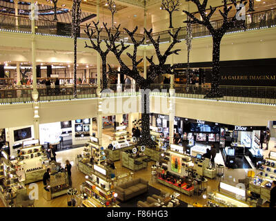 Paris Christmas Le Bon Marche - Decorated interior of Le Bon Marche ...
