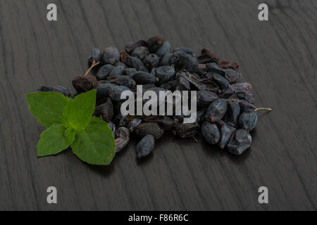 Dry blue berberis with mint Stock Photo - Alamy