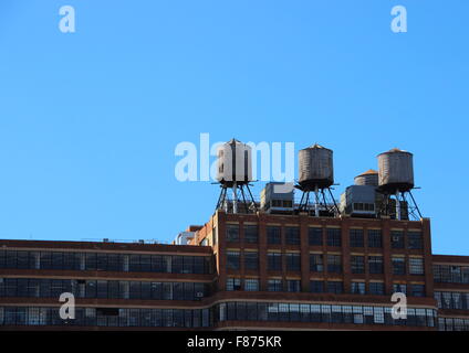 Water tanks on high steel stilts Stock Photo - Alamy