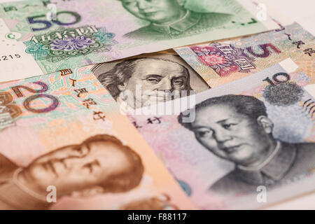 Hundred dollar bill surrounded by Chinese Yuan Stock Photo - Alamy
