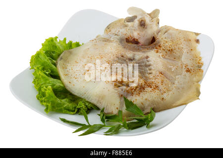 Grilled ray fish - Batoidea with salad Stock Photo - Alamy