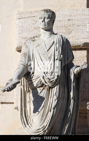 Ancient statue of a roman senator in Ostia Antica, the old harbour of ...