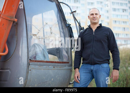 Portrait of tractor operator at construction site Stock Photo - Alamy