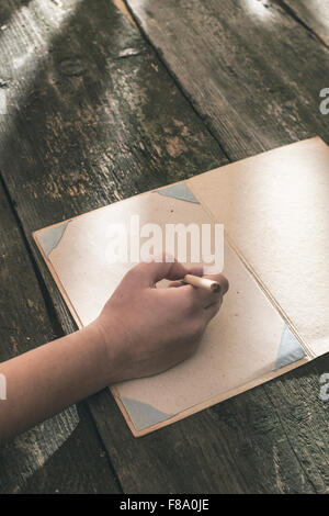Vintage pencil and drawing paper. Weak sunlight Stock Photo - Alamy